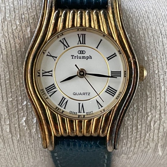 Triumph | Accessories | Vintage Triumph Ladies Wristwatch Blue Leather ...